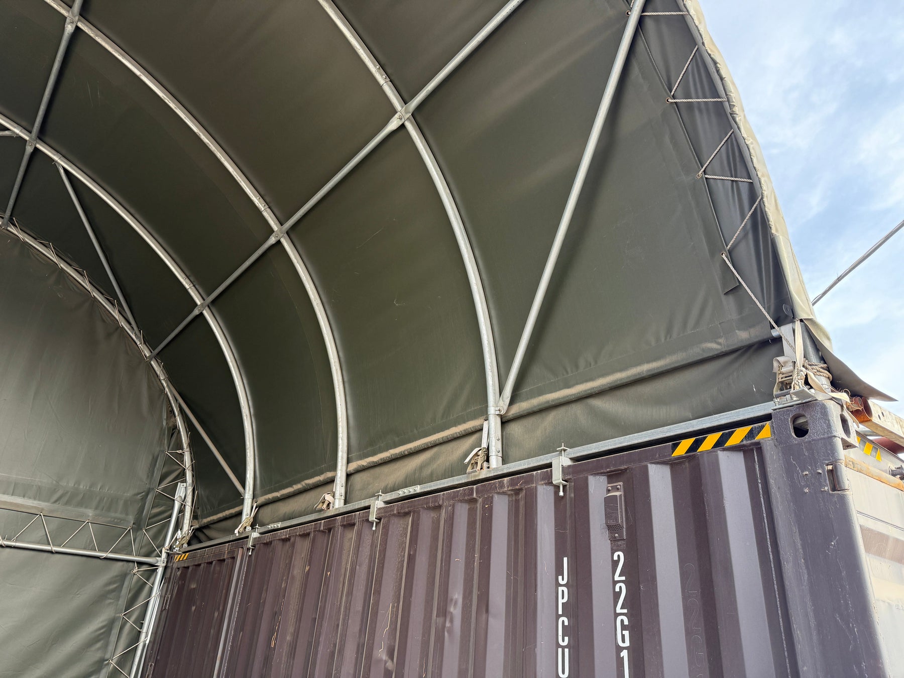 Clamping Attachment System for Container Canopies | Kit Buildings