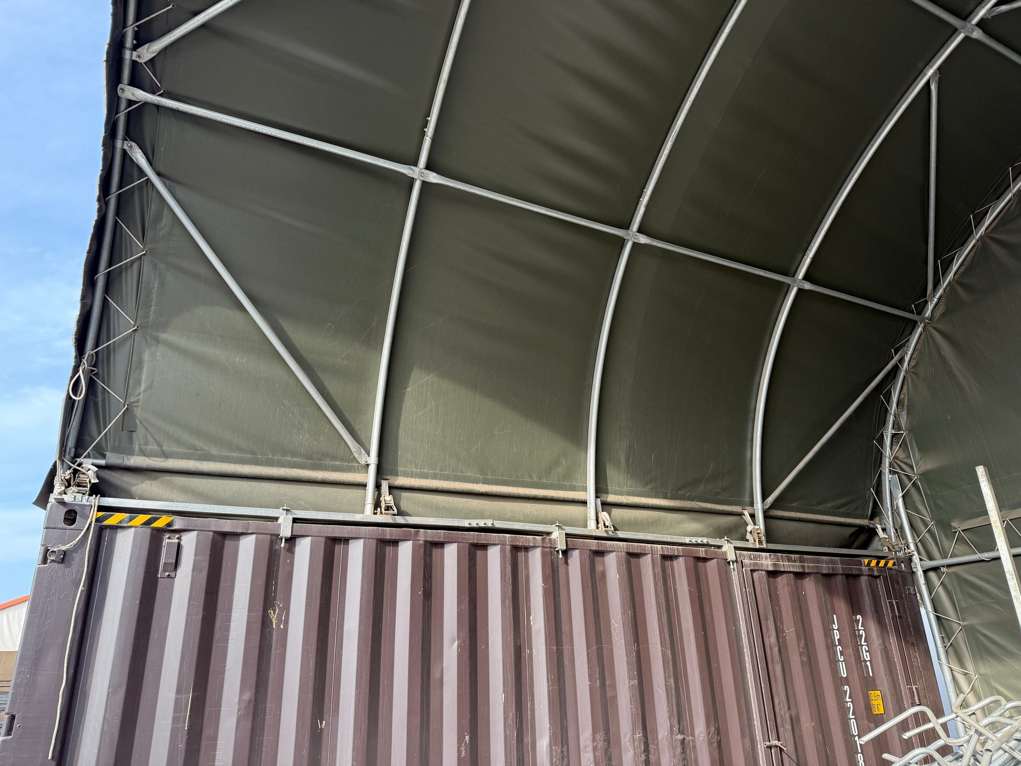Clamping Attachment System for Container Canopies | Kit Buildings